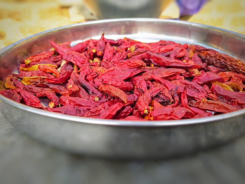 Red chilli in plate serve stock image. Image of focus - 192284135