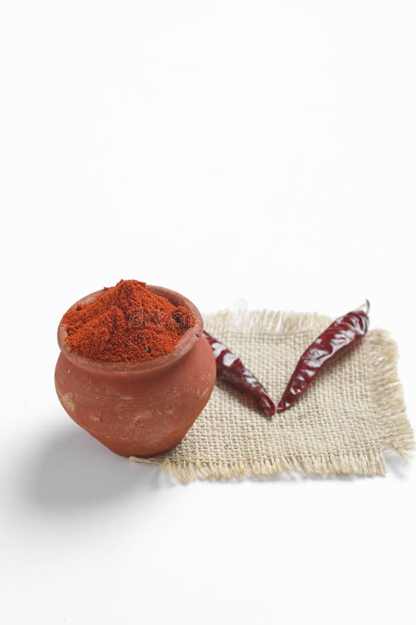 Red Chilli Powder with Dried Red Chillies. in Earthen Bowl Stock Image ...
