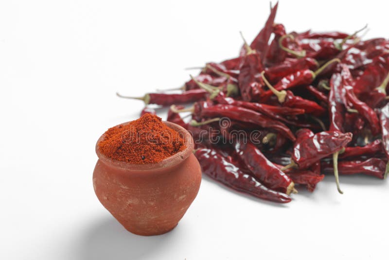 Red Chilli Powder with Dried Red Chillies. in Earthen Bowl Stock Image ...