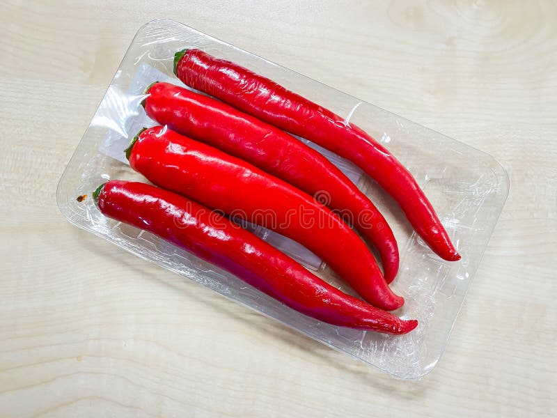 Red Chilli Spur Peppers in Plastic Pack Stock Image - Image of gourmet ...