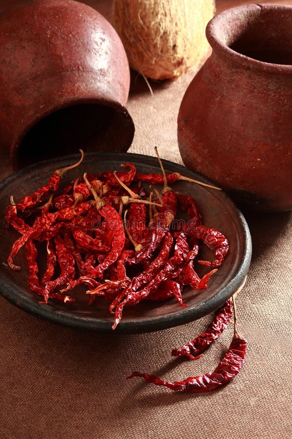 Red chilly in clay pot stock photo. Image of closeup - 52182382