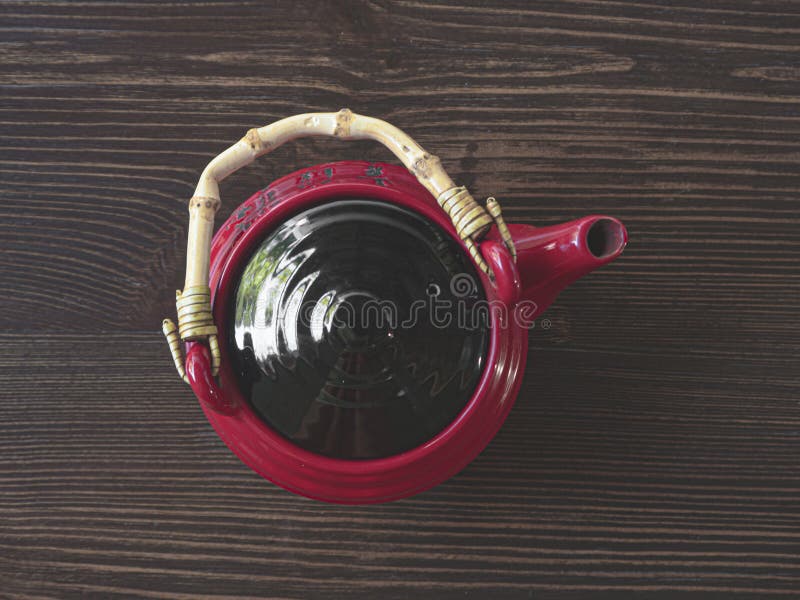 The Red Chinese Teapot on a Wooden Table. Top View Stock Photo - Image ...