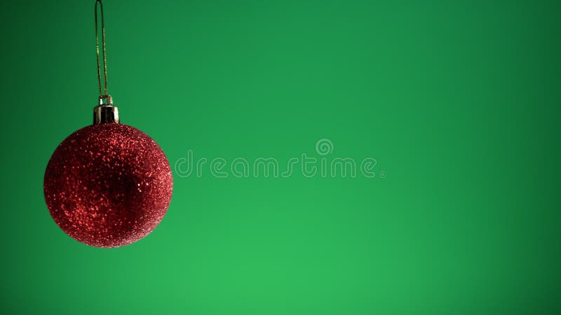 Red Christmas Ball with Green Background Stock Video - Video of xmas ...
