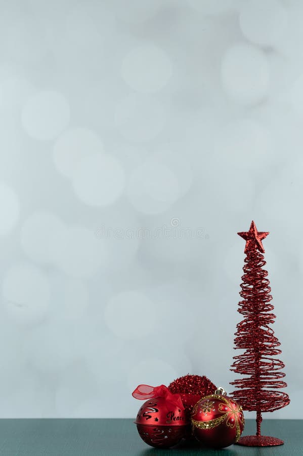 Red Christmas Decor Portrait on Green Table with White Background Stock ...