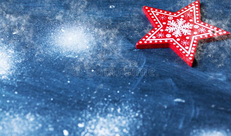 Red Christmas Decorations on Blue with Snow Stock Image - Image of ...