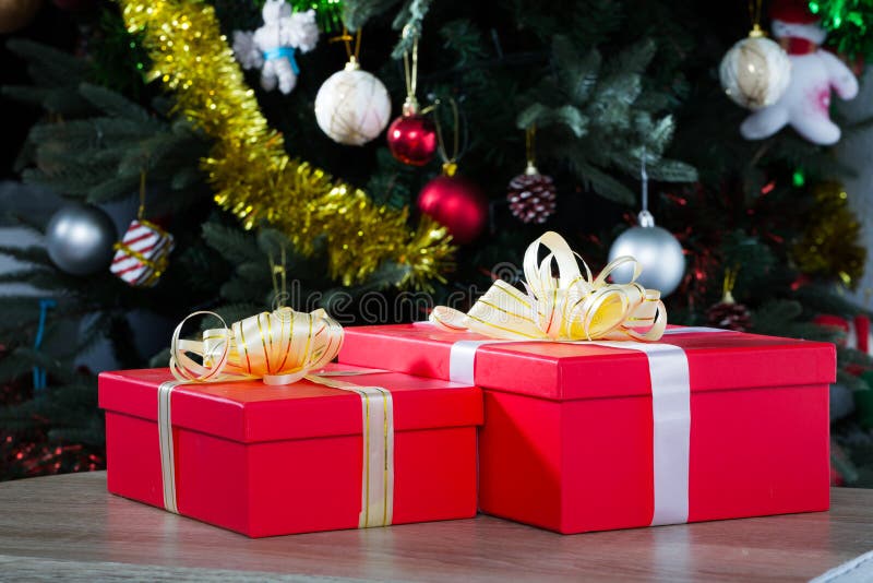 Red Christmas gift boxes stock image. Image of ribbon - 212876257