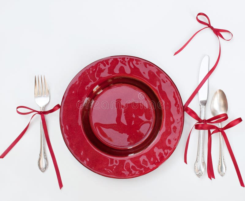 Red Christmas Place Setting with Bows Stock Photo - Image of bows ...