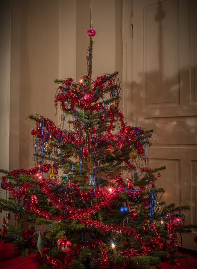 Red Christmas Tree with Shadow on Grey White Wall Stock Photo - Image ...