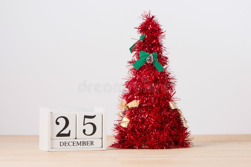 Red Christmas Tree on Table with Calendar 25 December Stock Image ...