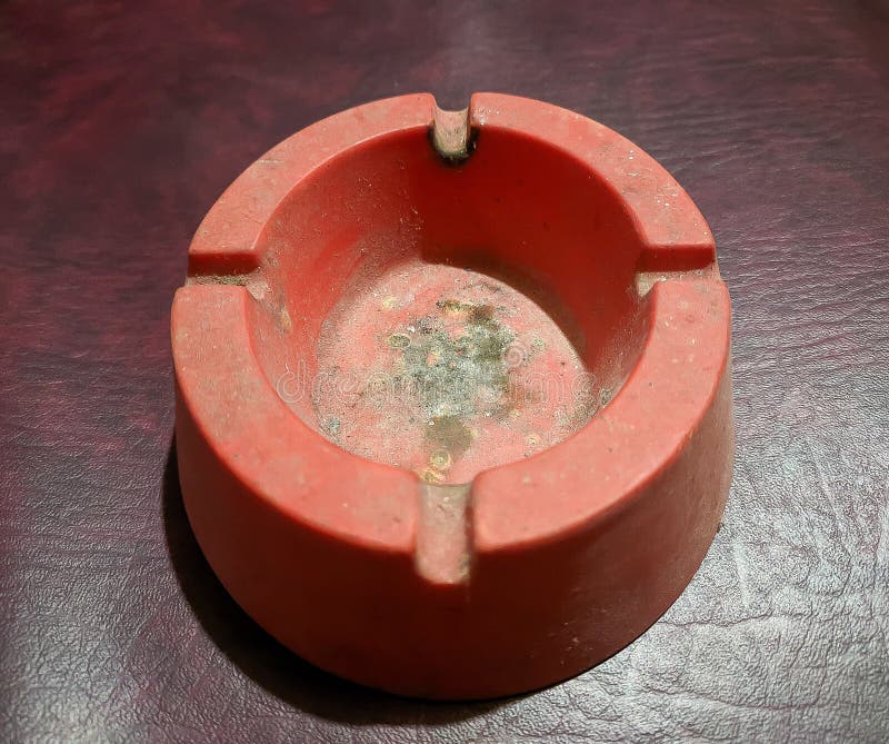 A Red Cigarette Ashtray Whose Ashes Had Been Removed Stock Image ...