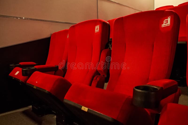 Red cinema seats stock image. Image of cloth, movie, arts - 91905331