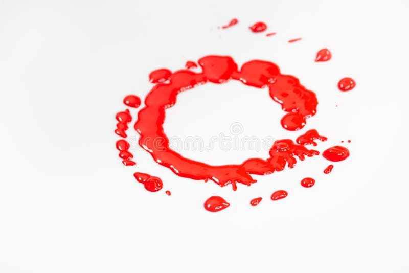 A Red Circle Drips Onto a Spinning White Background. Stock Image ...