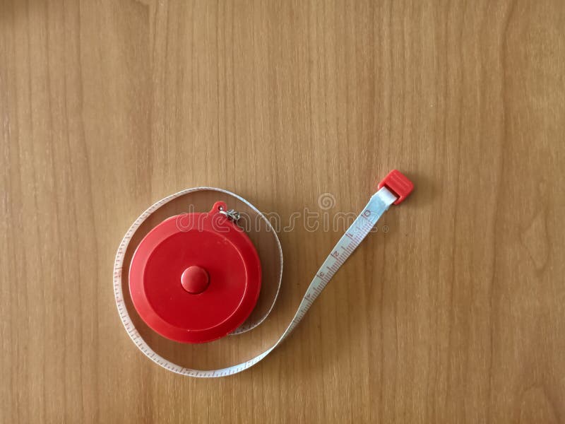 Red Circle Measure Tape with White Line on Wooden Texture Stock Image ...