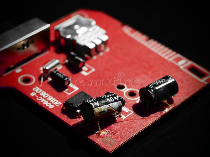 Red Circuit Board on Black Background Stock Photo - Image of components ...