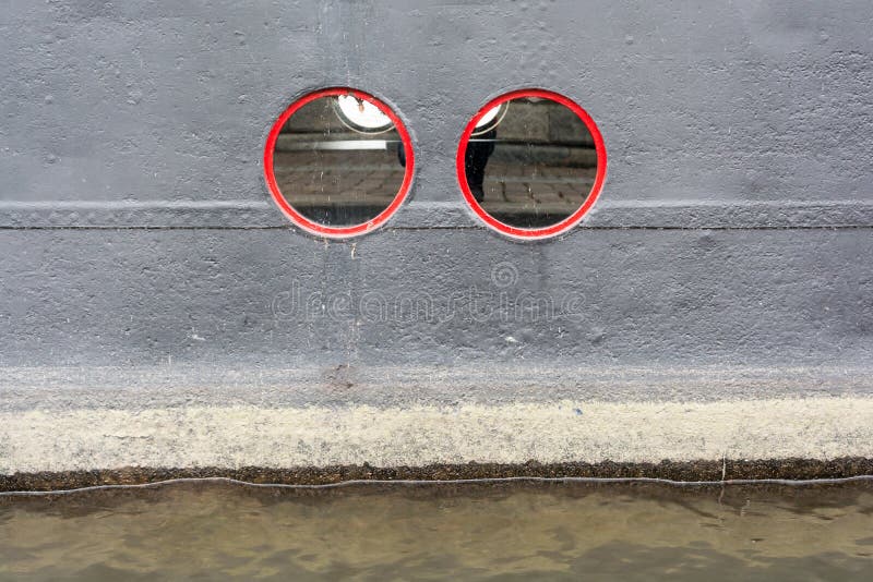 Red Circular Windows on the Black Cruise Ship Stock Image - Image of ...