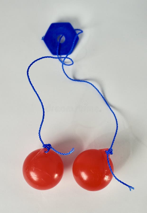 Red Clackers Balls Toy with Blue String Stock Image - Image of leisure ...