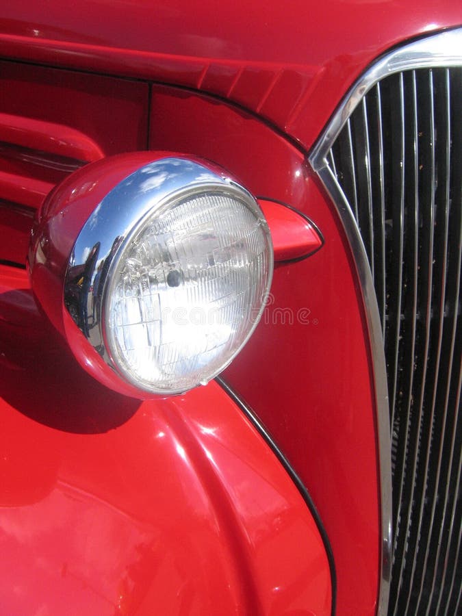 Red Classic Car Single Headlight and Partial Bumper Stock Photo - Image ...