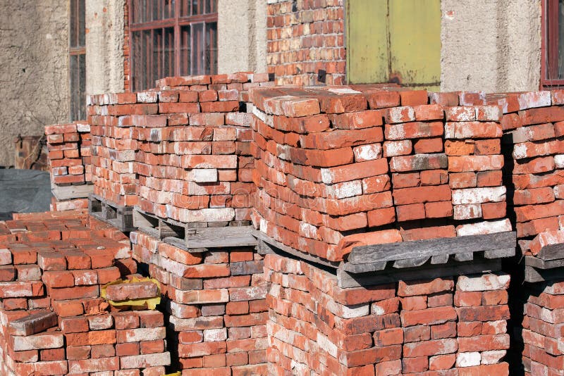 Red Clay Building Bricks Stacked on Pallets for Delivery Stock Image ...