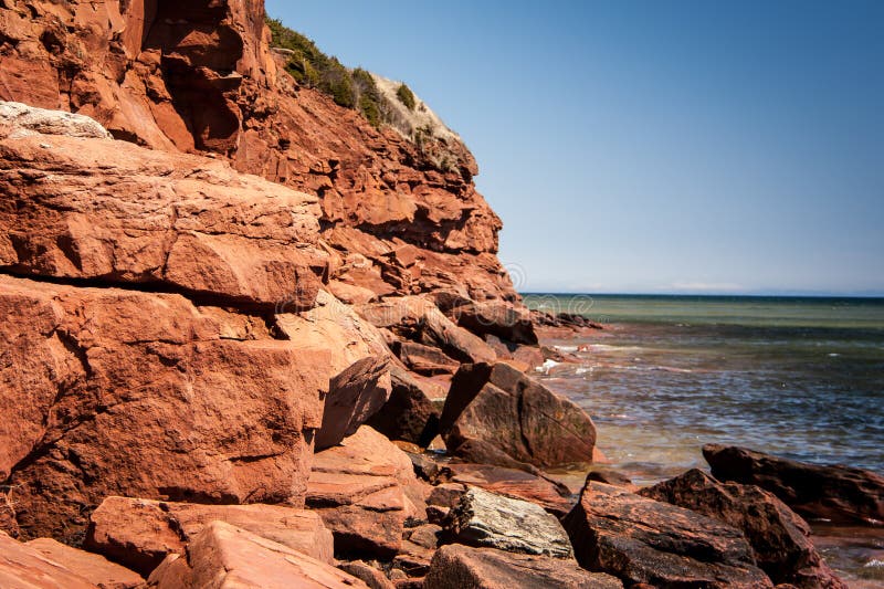 Red cliff stock image. Image of island, ocean, summer - 36423435