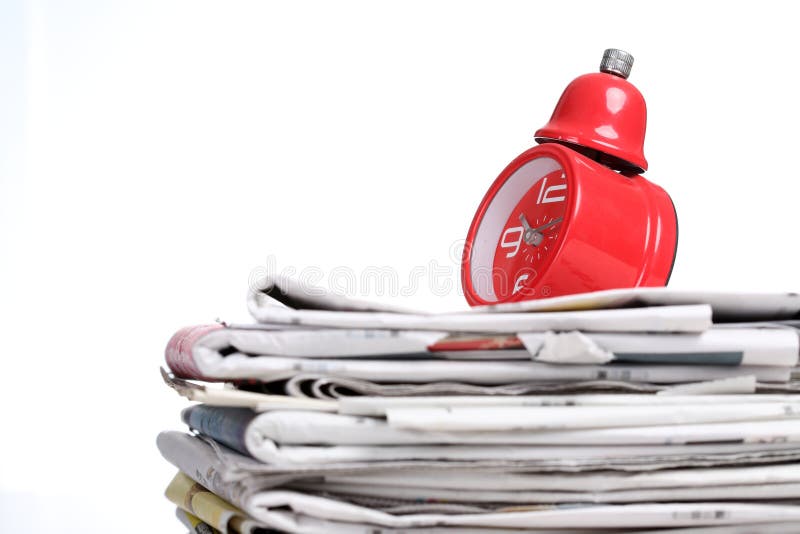Clock and pen on newspaper stock image. Image of finance - 7597367