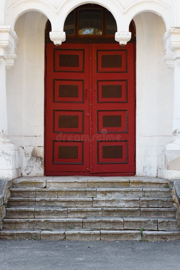 Red Closed Door with White Columns and Old Ancient Steps Stock Image ...