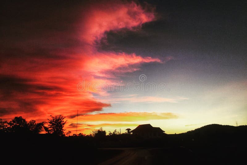 Red cloud stock image. Image of mountain, sunset, cloud - 147582493