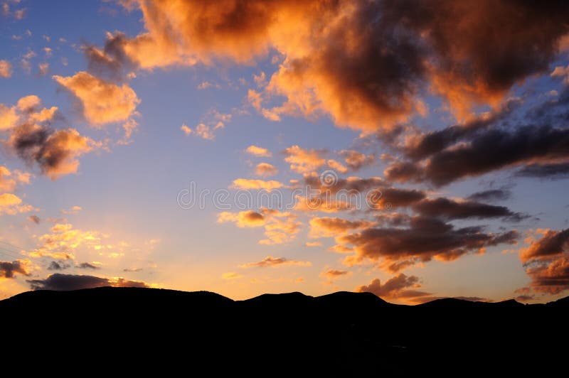 Red clouds at sunset stock image. Image of golden, clouds - 35353423