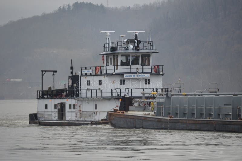 Barge going under bridge. editorial photo. Image of ship - 96996986