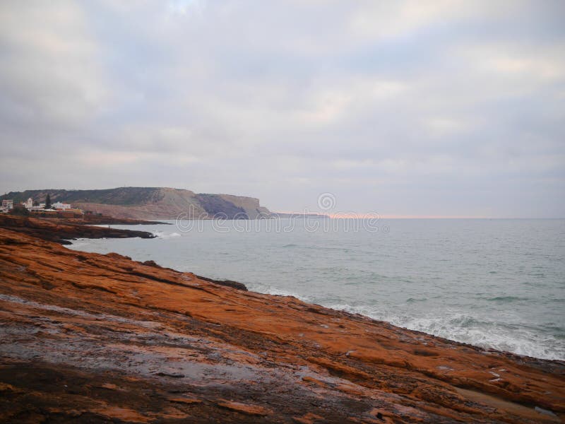 Red Coast stock image. Image of coast, cove, rock, morning - 342825485