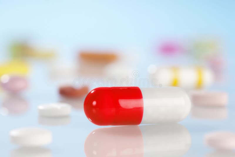 Red coated tablet stock photo. Image of medicine, pill - 40319382