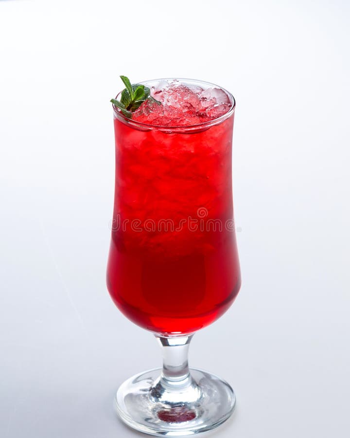 Red Cocktail with Ice in a Tall Glass Decorated with Mint on a White ...