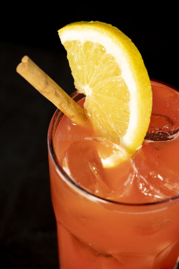 Red Cocktail with Red Juices, Alcohol and Lime Wedge Stock Image ...