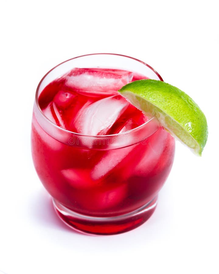 Red cocktail with a lime stock photo. Image of cranberry - 97701976