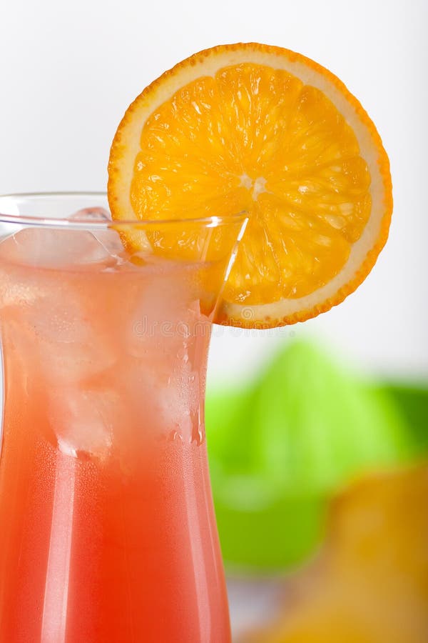 Red cocktail with orange stock photo. Image of glass - 11634672