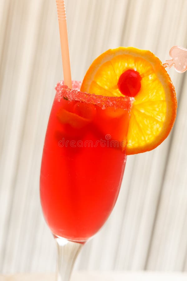 Red cocktail with orange stock photo. Image of color - 26104238