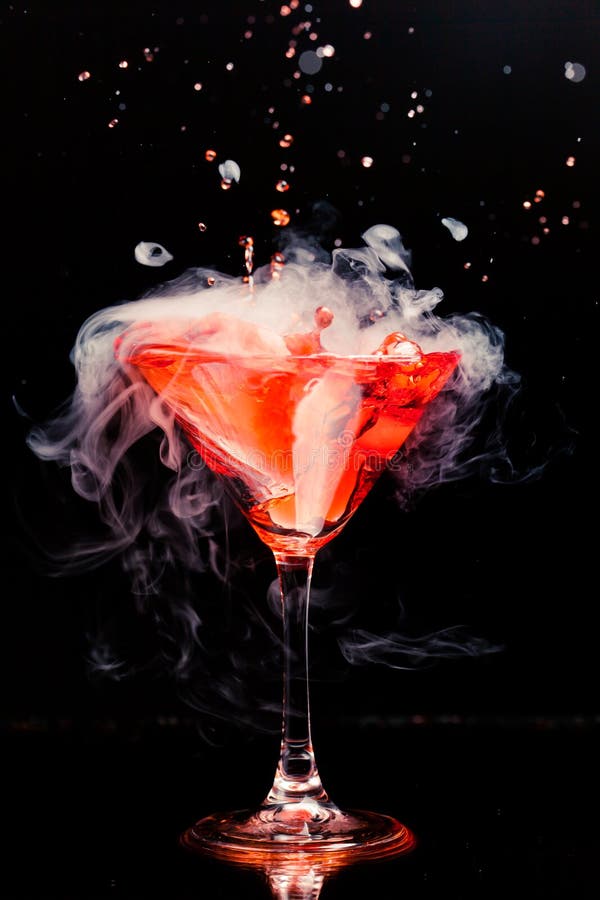 Red cocktail with splash stock photo. Image of black - 34888720