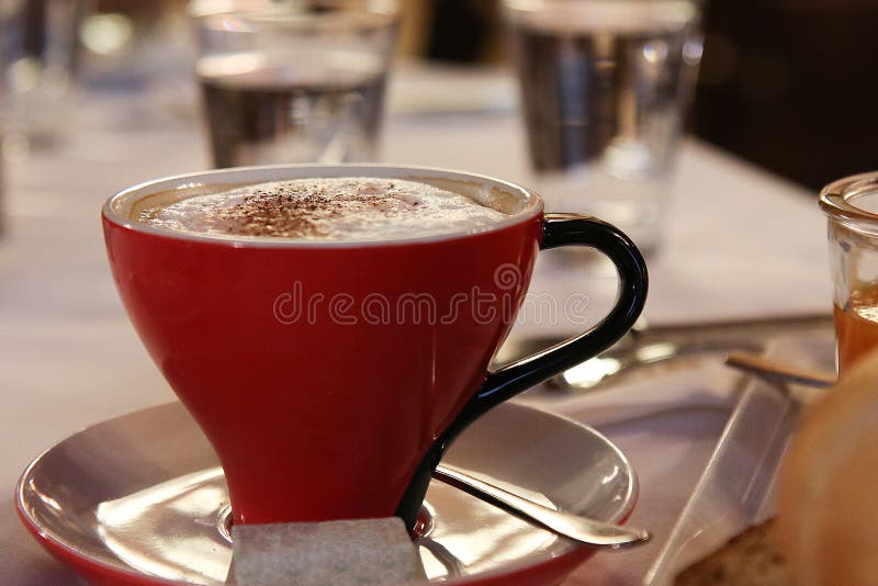 Red Coffee Cup on Table in Blurred. Red Espresso Cup Stock Photo ...