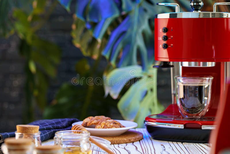 Red Coffee Machine with a Glass on Kitchen Counter Stock Photo - Image ...