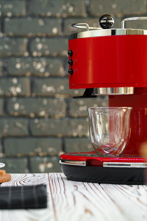 Red Coffee Machine with a Glass on Kitchen Counter Stock Image - Image ...