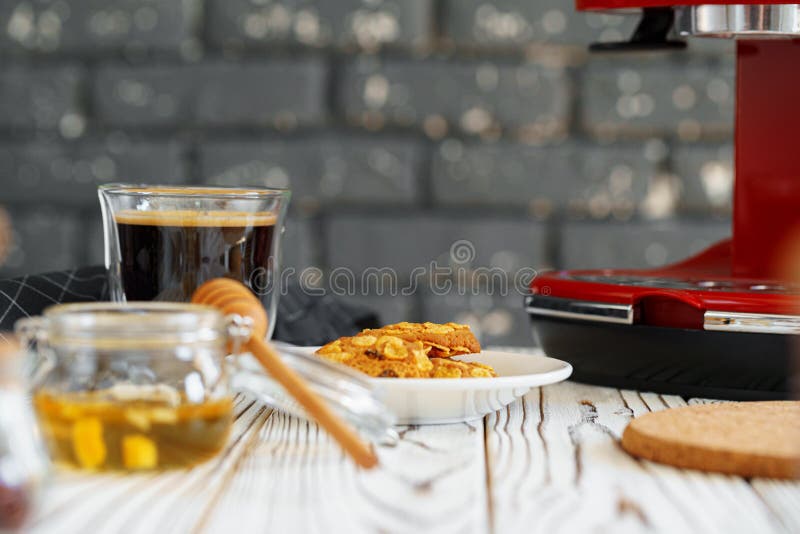 Red Coffee Machine with a Glass on Kitchen Counter Stock Photo - Image ...