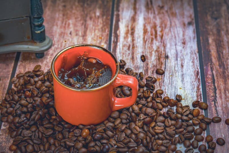 Red Coffee Mug Beans Falling Inside Stock Photos - Free & Royalty-Free ...