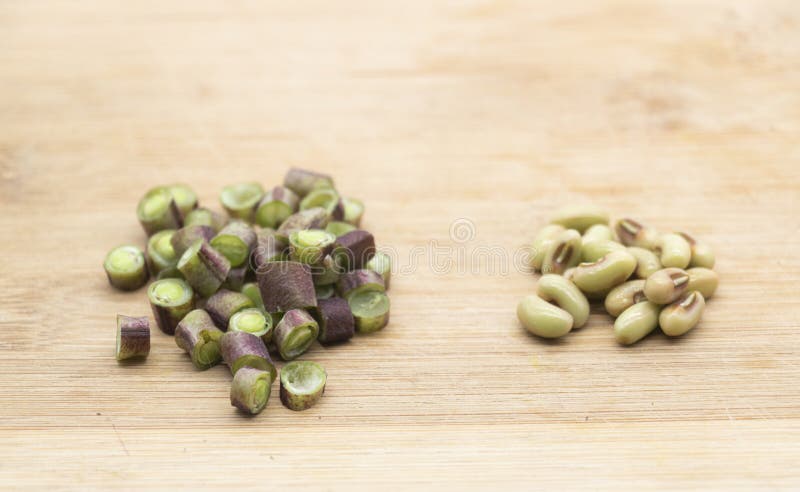 Red Color Fresh Yardlong Bean Pieces Over on Wood Background Stock ...