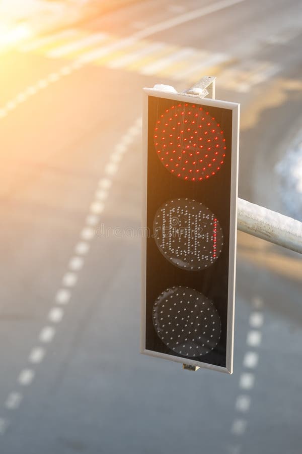 Red Color Light is Shown on a Modern LED Traffic Light Hanging Over the ...
