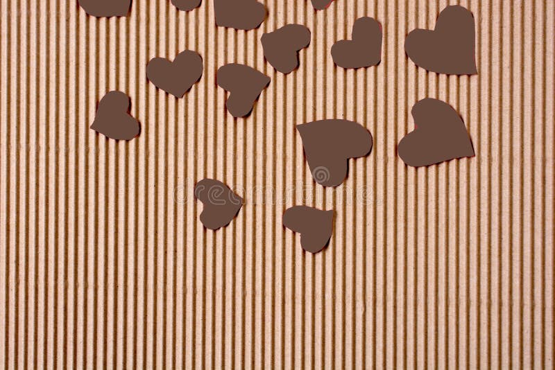 Red Color Paper Hearts on a Brown Cardboard Stock Illustration ...
