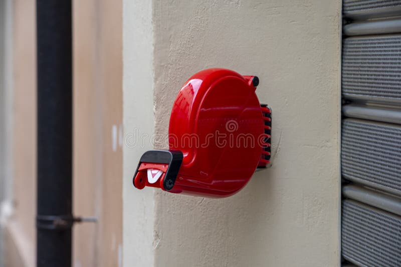 Red Color Shop Queue Eliminator Fixed To the Wall Stock Image - Image ...