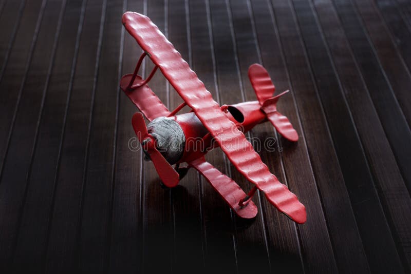 Red Color Toy Plane on Wooden Texture Stock Image - Image of ...