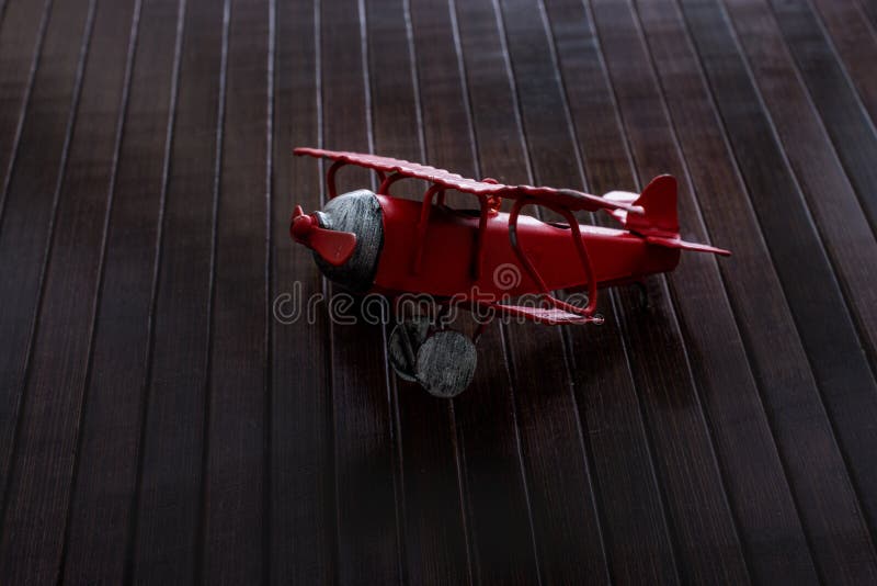 Red Color Toy Plane on Wooden Texture Stock Image - Image of world ...
