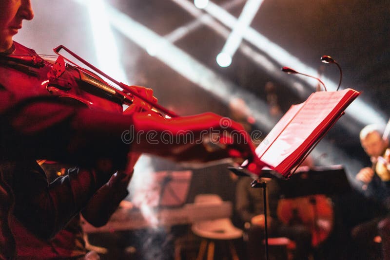 Red colored violin concert stock photo. Image of melody - 166243636