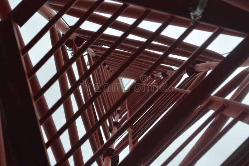 Red Communication Tower Made of Iron Pipes and Angles Stock Photo ...