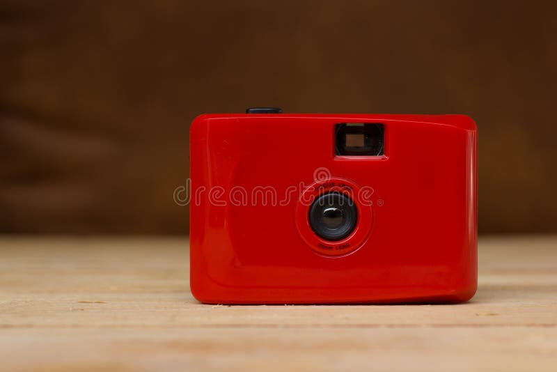 Red compact film camera. stock photo. Image of liqueur - 71543174
